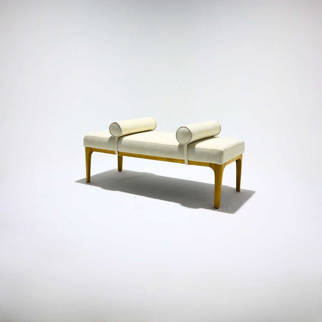 Upholstered bench with bolsters store